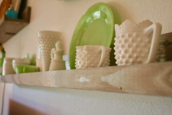 How To Style A Picture Rail Using Vintage Finds - The Antiqued Journey