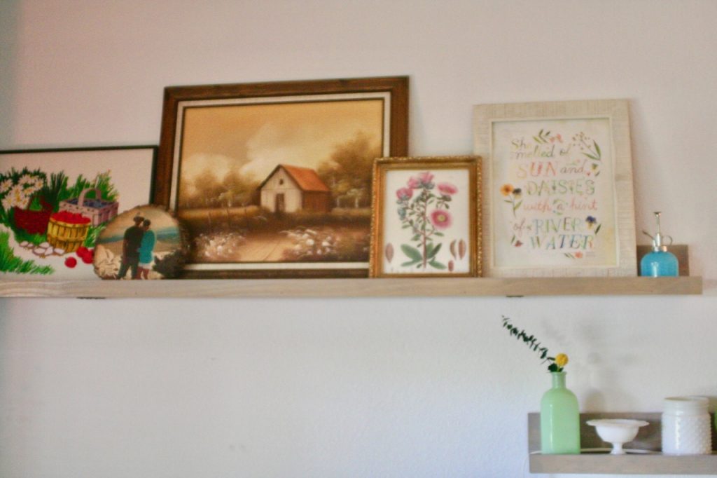 How To Style A Picture Rail Using Vintage Finds - The Antiqued Journey