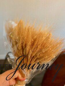 Fall Centerpiece With Amber Bottles and Brass - The Antiqued Journey