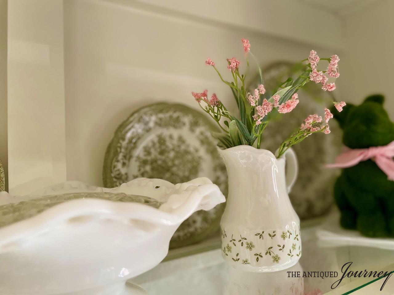 Vintage Spring Decor Styled in a Hutch - The Antiqued Journey