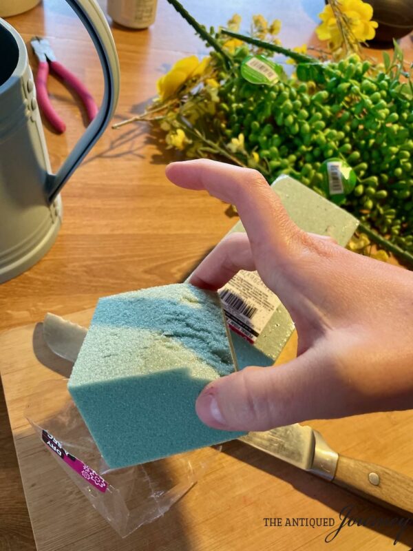 Watering Can Wreath DIY for Outdoor Spring Decor - The Antiqued Journey