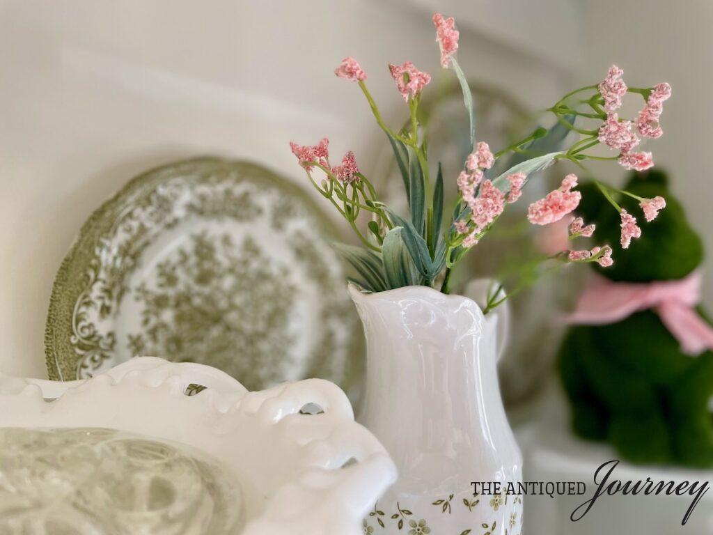 Vintage Spring Decor Styled in a Hutch - The Antiqued Journey