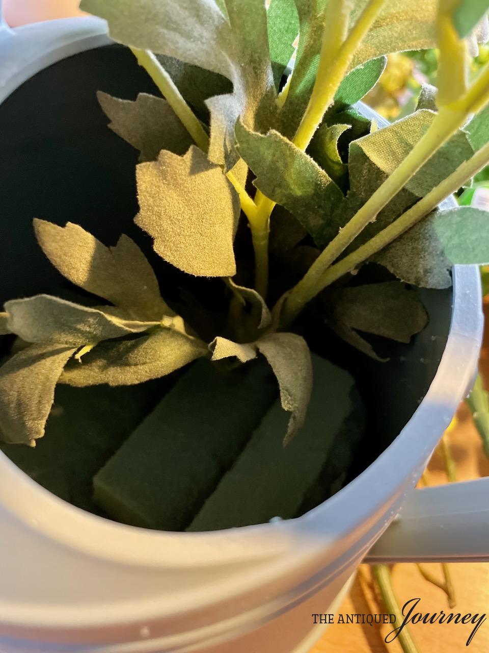 Watering Can Wreath DIY for Outdoor Spring Decor - The Antiqued Journey